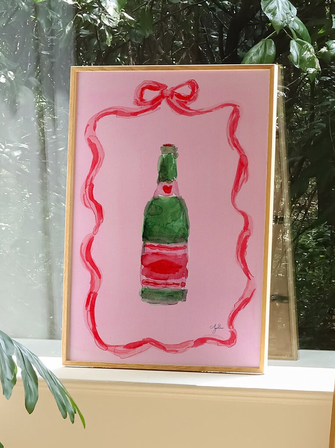 Champagne Bottle With Pink and Red Label and Red Ribbon With Bow ...