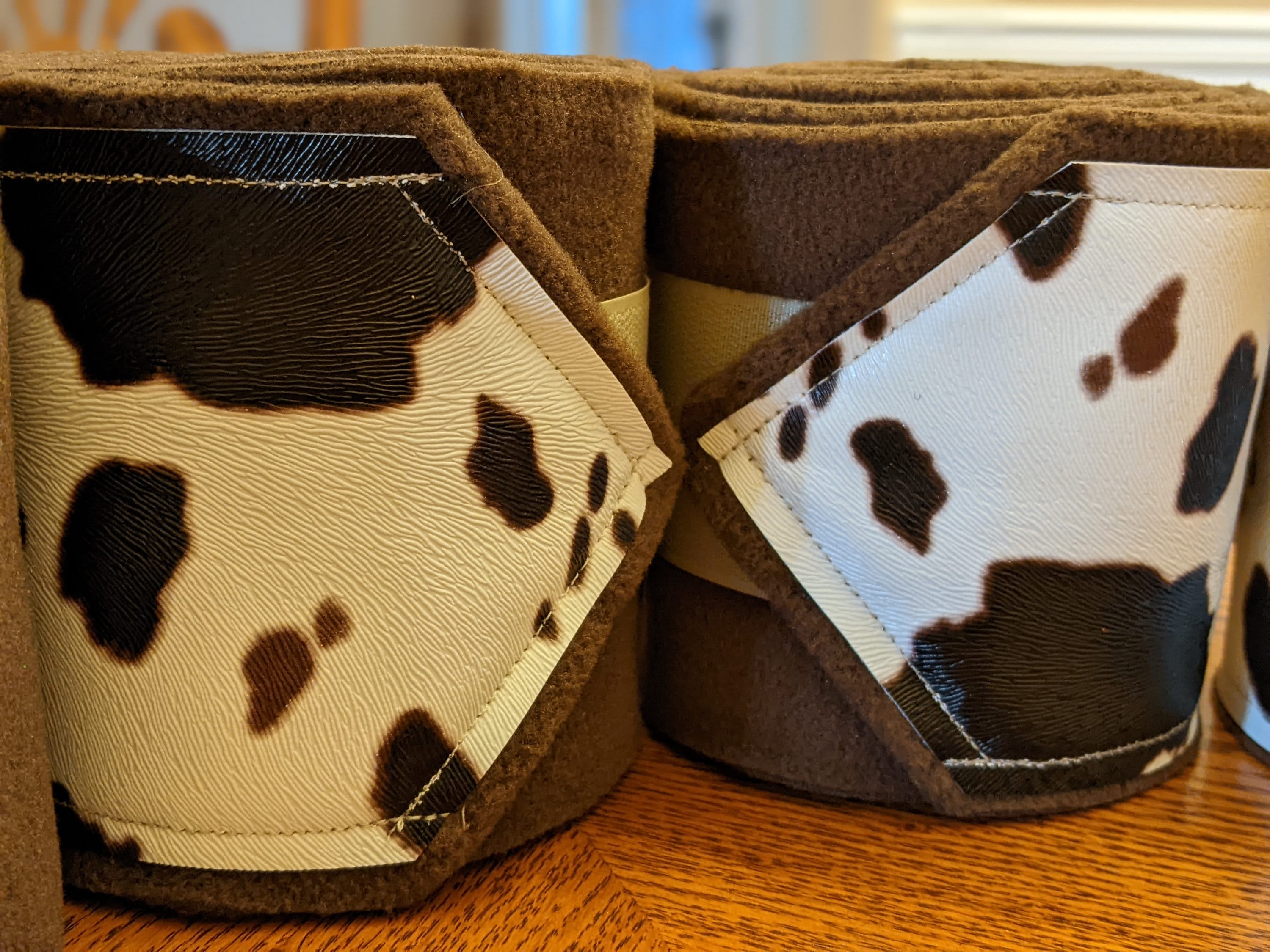 Brown Cow Print Polo Wraps, Cow Print Vinyl Over Warm Brown Fleece ...