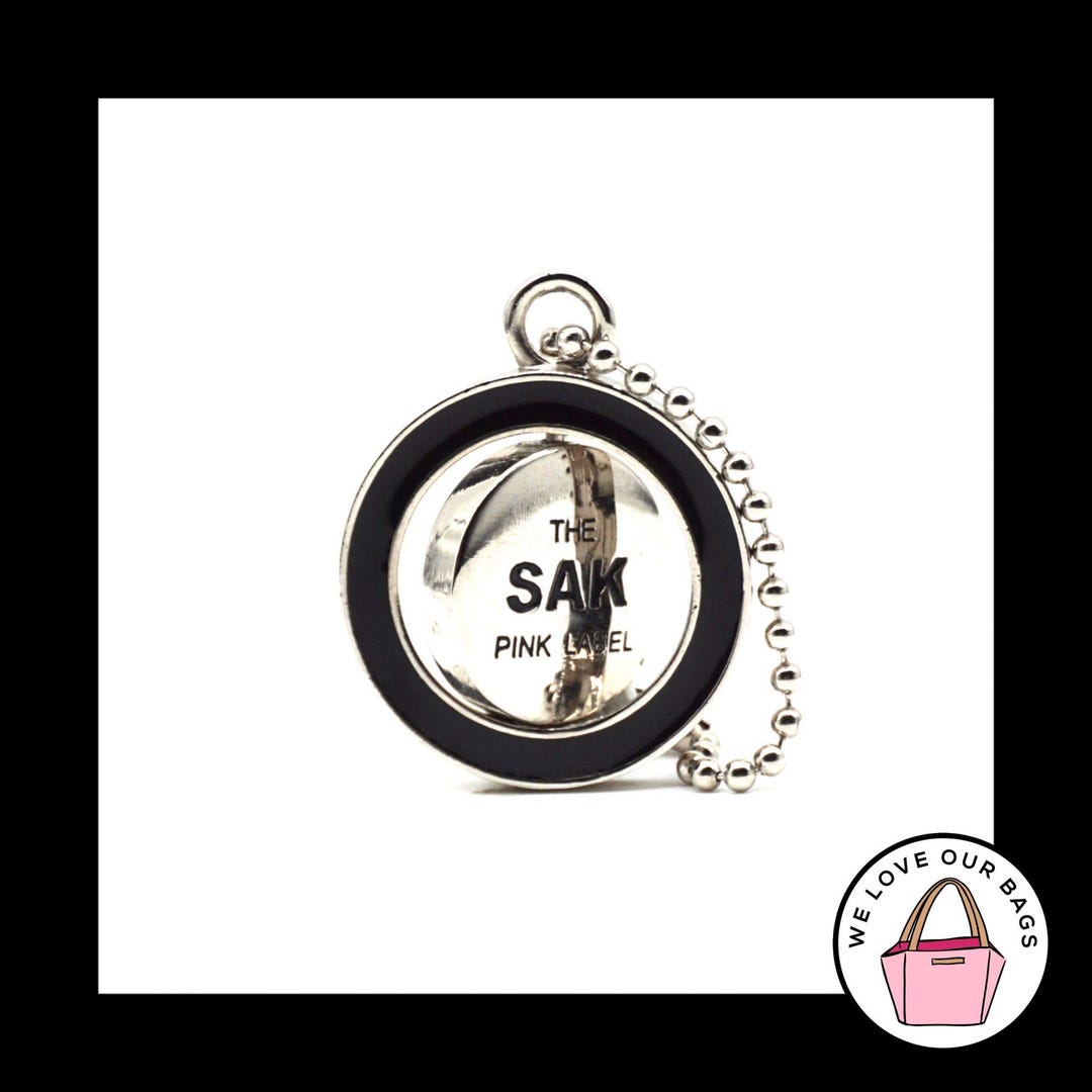 THE SAK Pink Label SWIVEL Silver Metal Disc Key Fob Bag Charm Keychain ...
