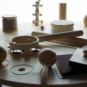 Percussion Instruments on Round Table Eco Friendly Wooden Instruments ...