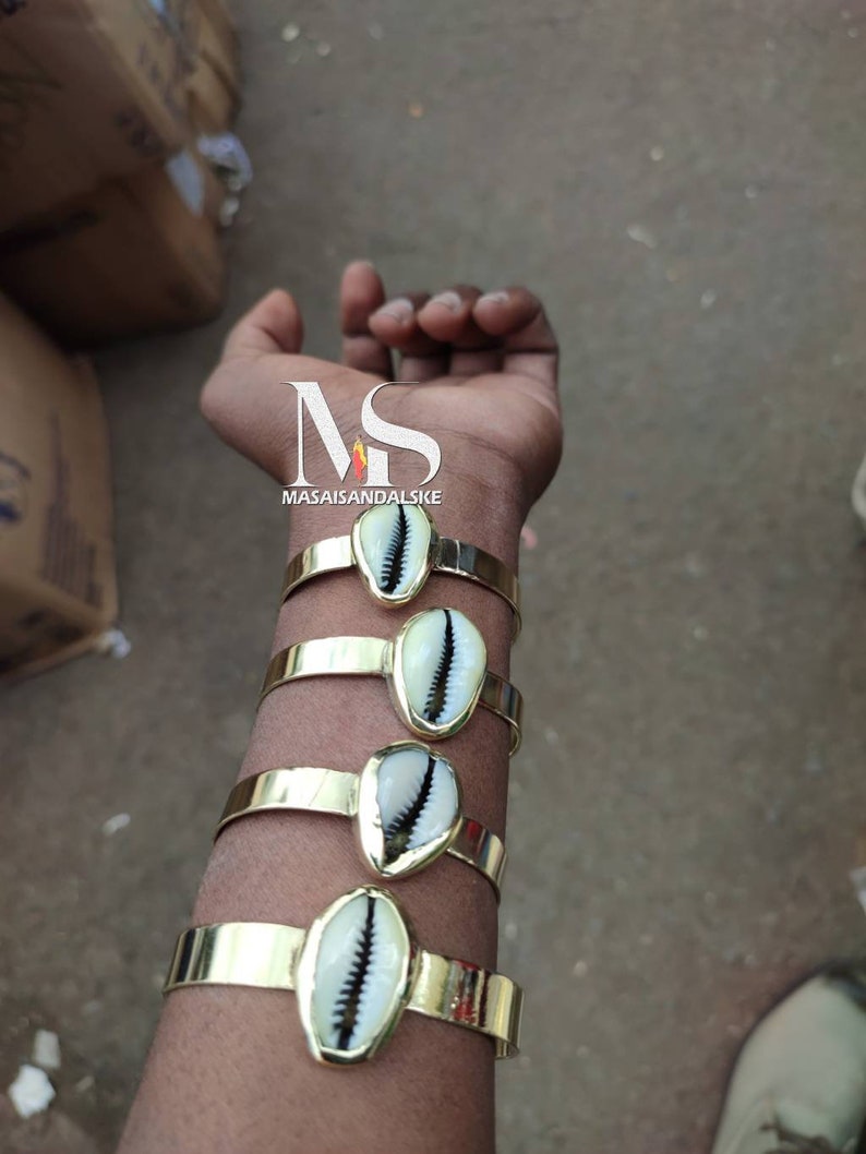 Cowrie Shell Bracelets african Brass and Cowrie Bracelets - Etsy
