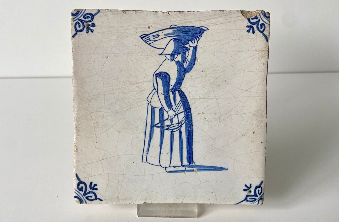 17th Century Delft Tile - Woman Holding a Bowl and Another Object in ...