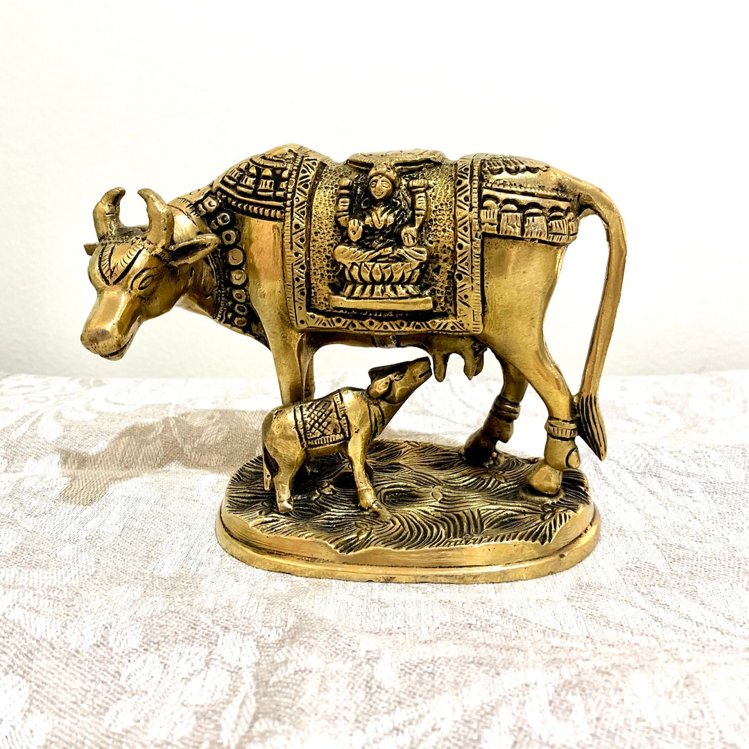 Brass Cow and Calf in Goddess Lakshmi and Vinayaka Carvings; Maa ...