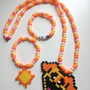 Smiling Critters Necklace - Etsy