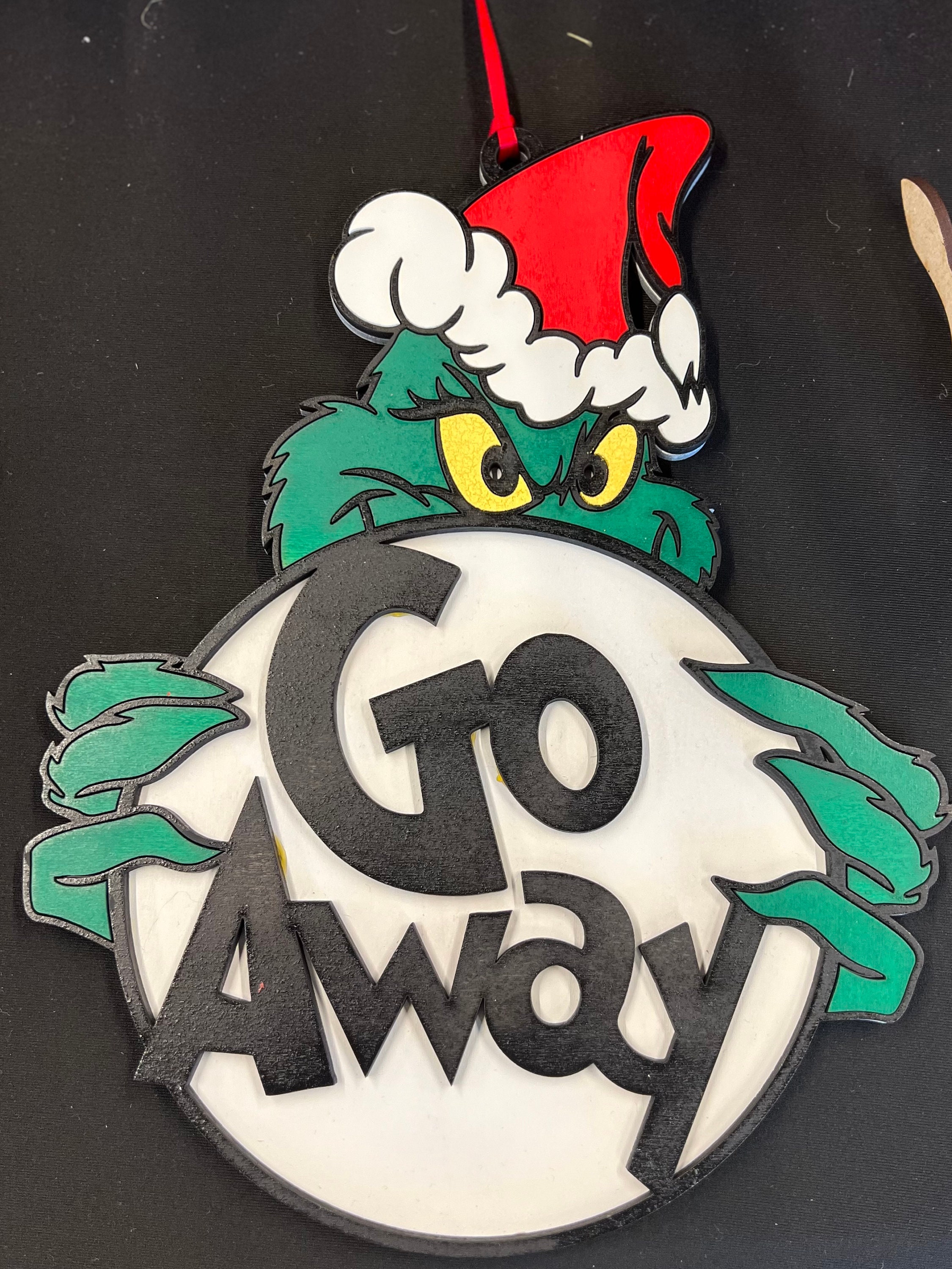 Embrace the Spirit of Whoville With Our Grinch Inspired Go Away Door ...