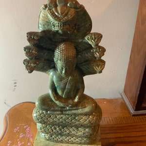Meditation Buddha,sitting on Serpent Rolled up Body as Seat,under the ...