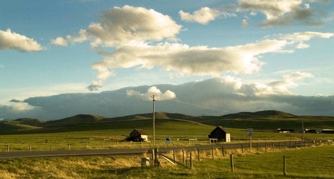 A Prairie Road and Barns in Late Afternoon Color Western Landscape ...