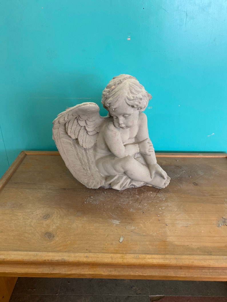 Sideways angel concrete statue | Etsy