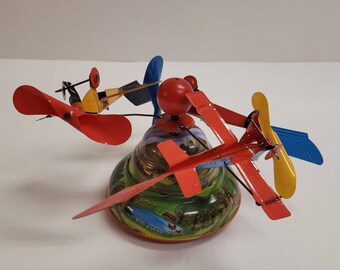 Wind up Tin Toy - Etsy
