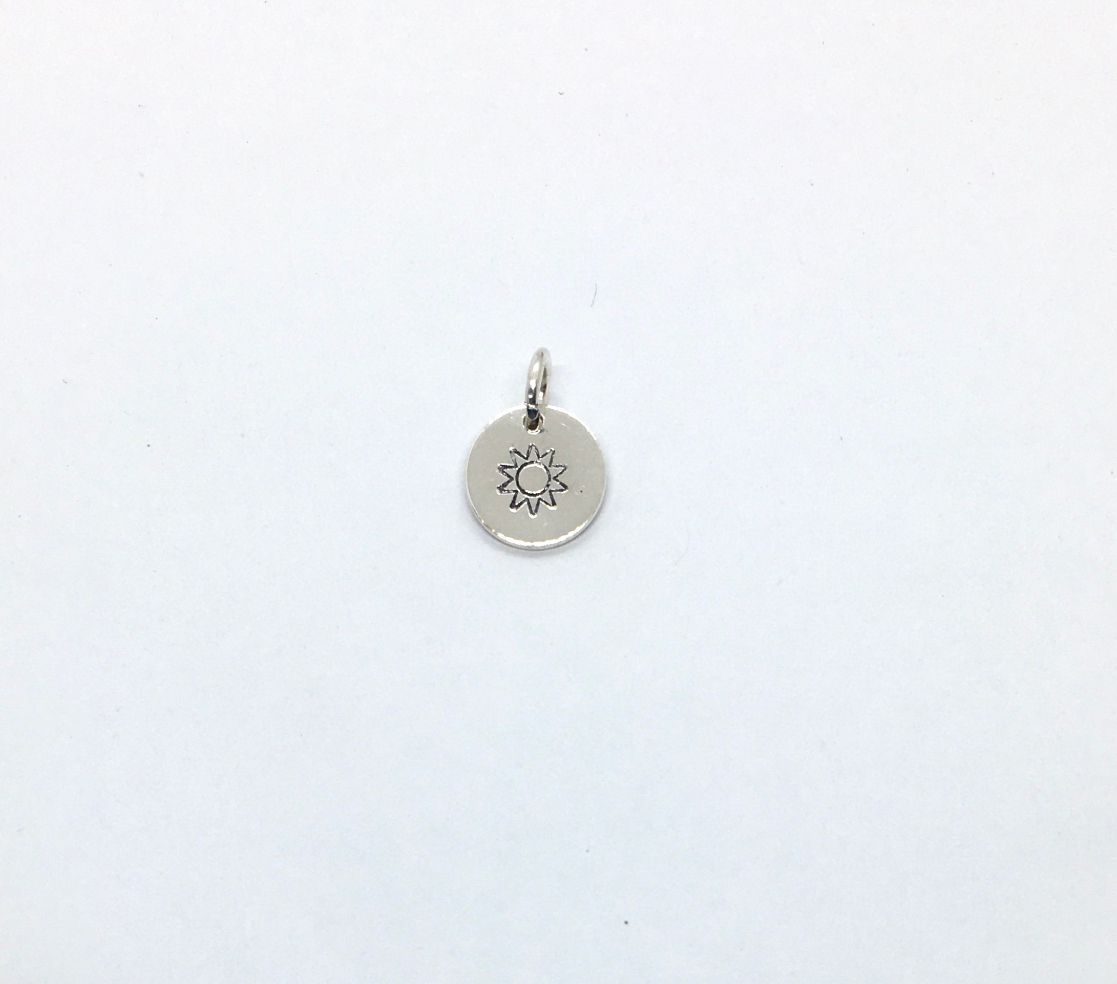 Sun stamped round sterling silver charm | Etsy