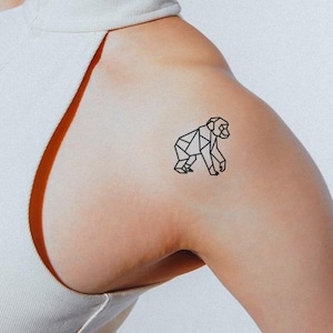 geometric monkey tattoo