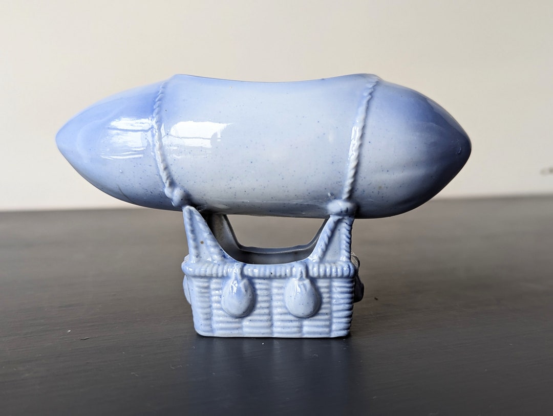 Vintage Zeppelin. Old Porcelain Aircraft Figurine That Can Stand or ...