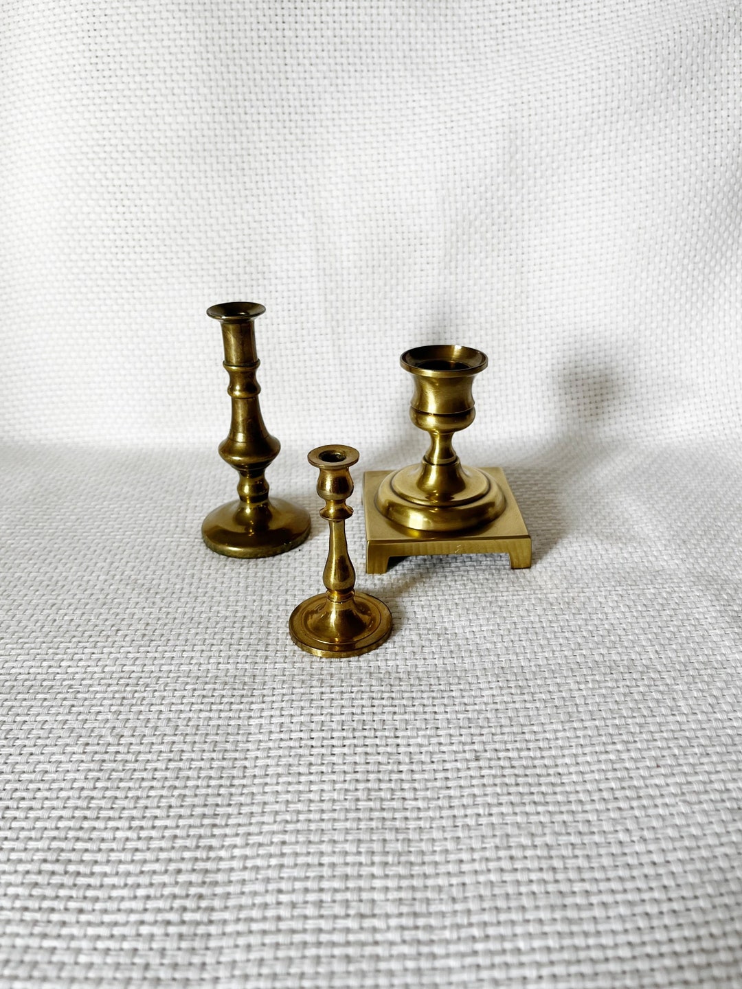 Three Different Size Brass Candle Stick Holders With Some Patina ...