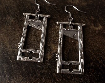 Jeff bezos guillotine earrings etsy store