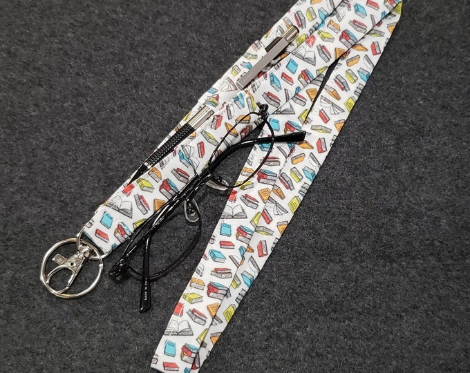 Books on White Lanyard With 2 Pen Loops, Glasses Loop, Badge and Key ...