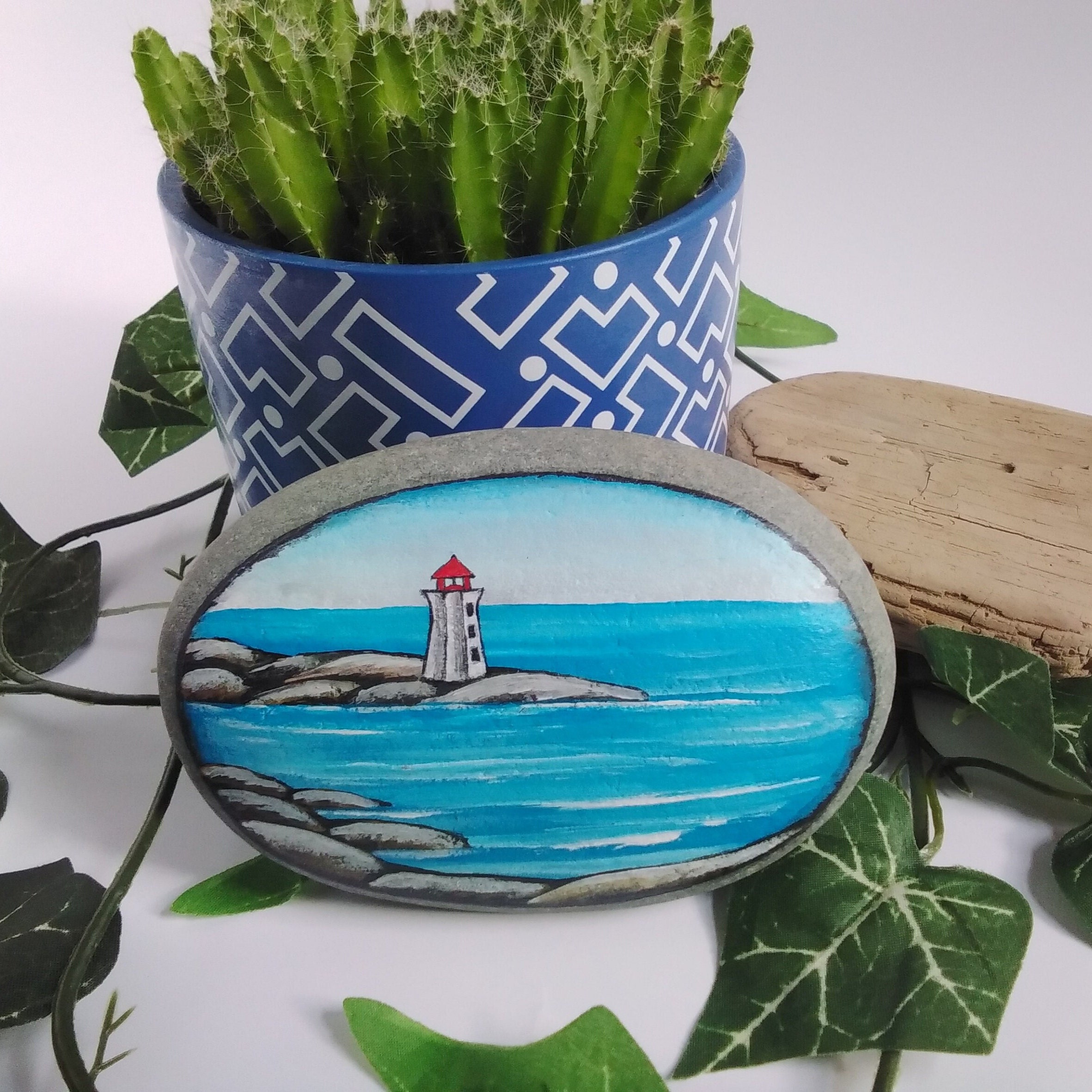 Lighthouse Painting With Ocean Scene on Stone - Lighthouse Painted Rock ...
