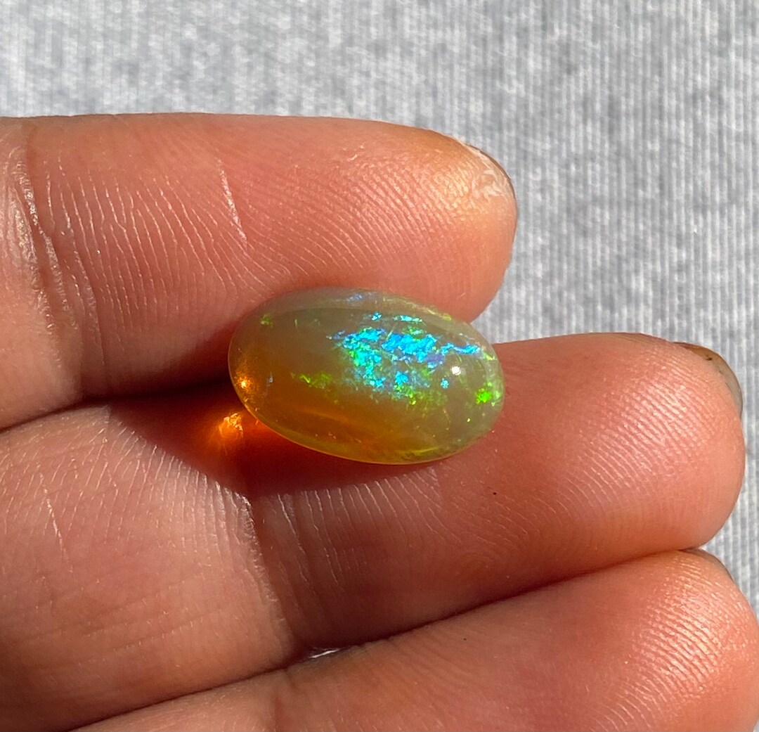 Natural Ethiopian Brown Opal Cabochon 2.64 Carat 13x8.3 MM Oval Welo Fire Opal AAA Quality ...