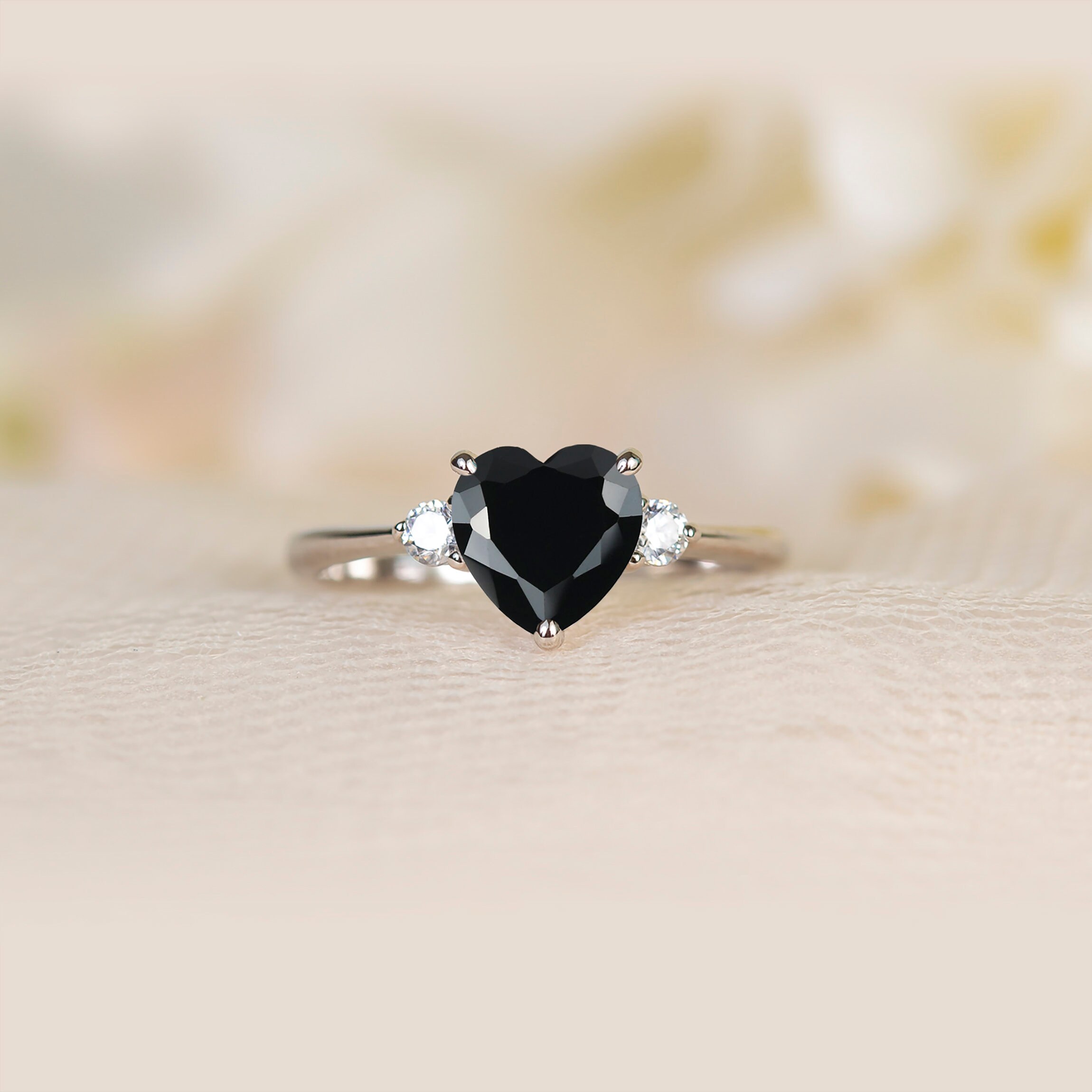 Heart shaped black diamond ring store