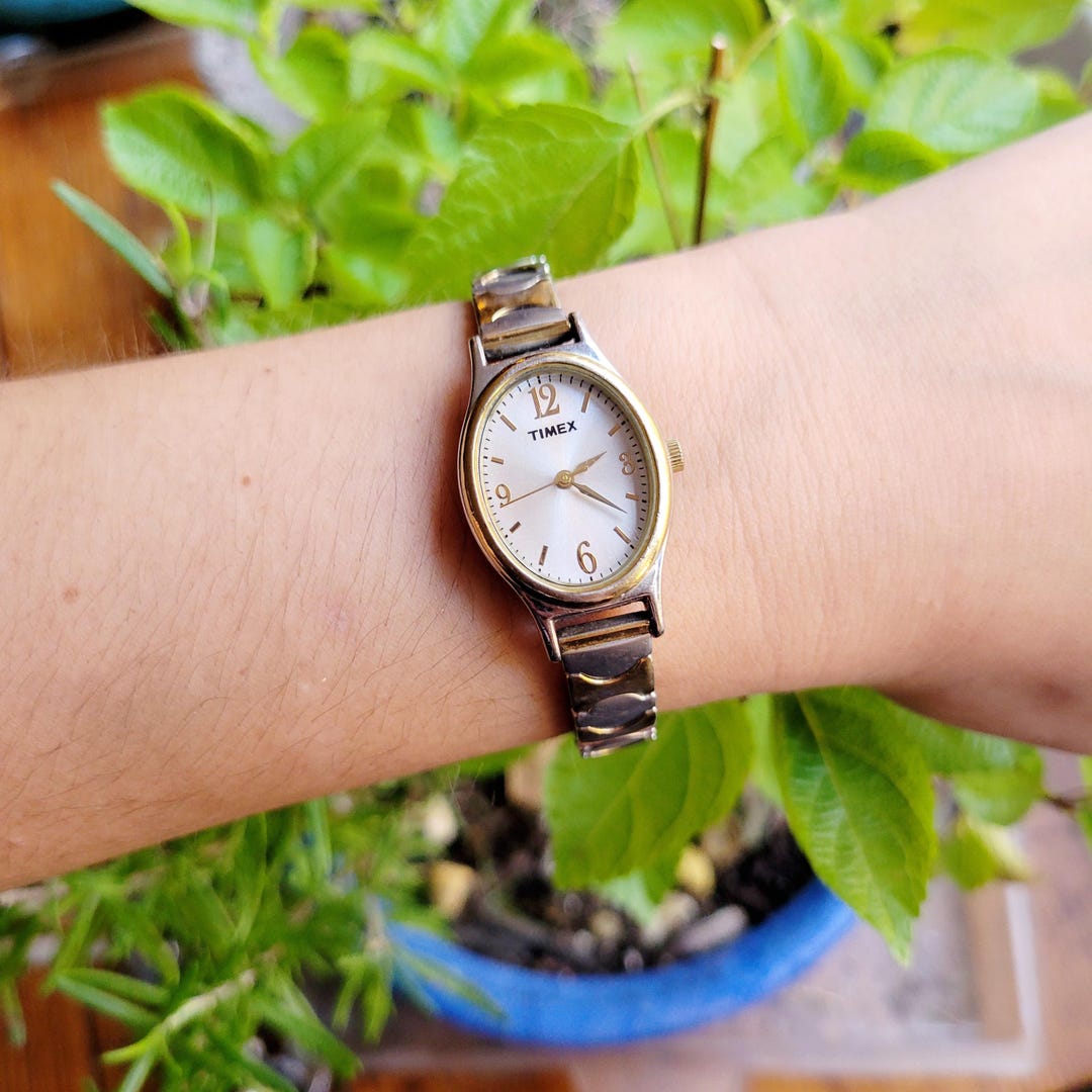 Vintage Timex Classic Womens Womans Gold & Silver Oval Analog Stretch ...