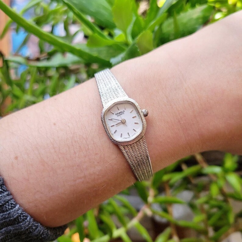 Vintage Dainty Silver Caravelle by Bulova Quartz Watch - Etsy