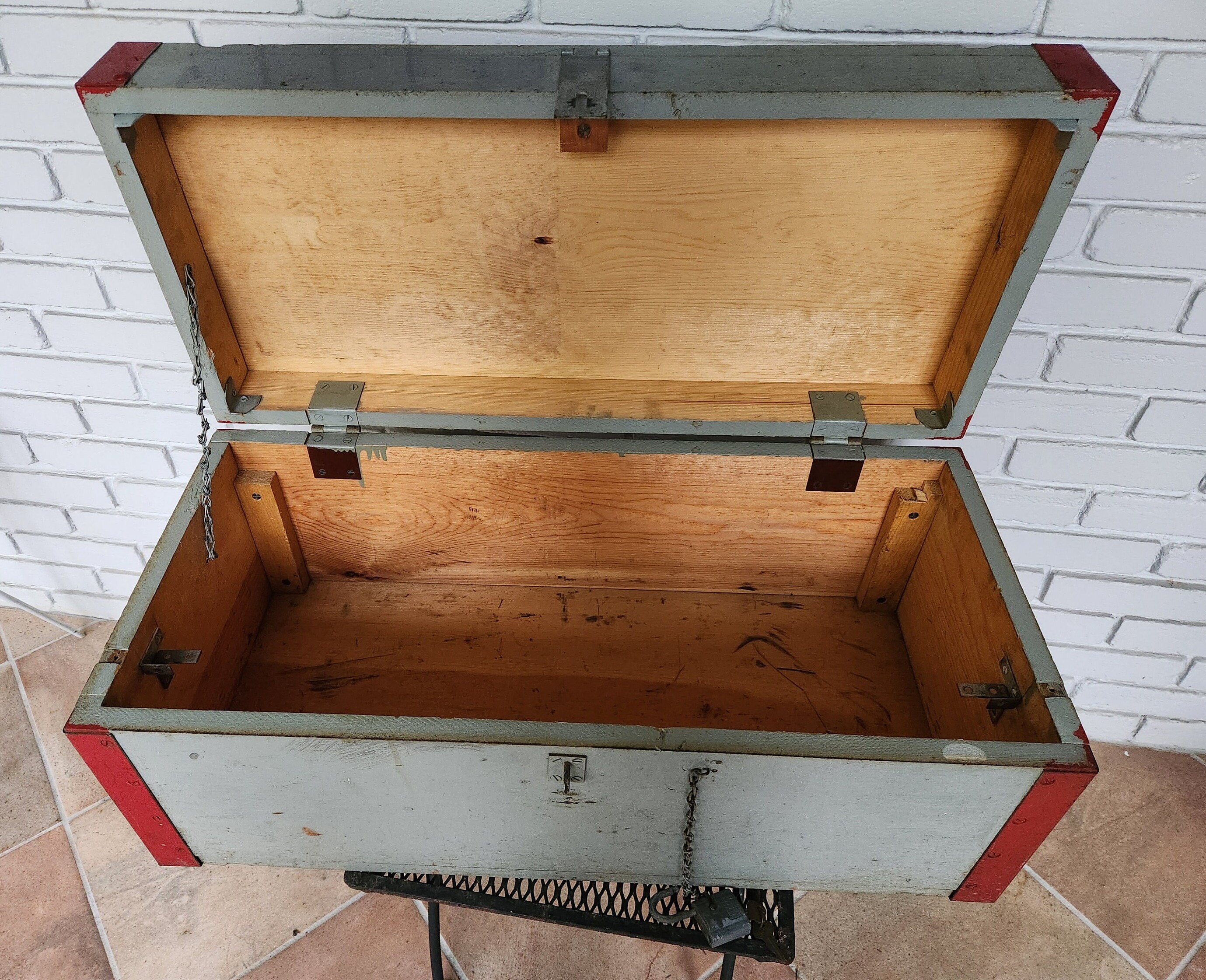 A Gray and Red Trunk From the 1950s Featuring a Chicago Lock Company ...