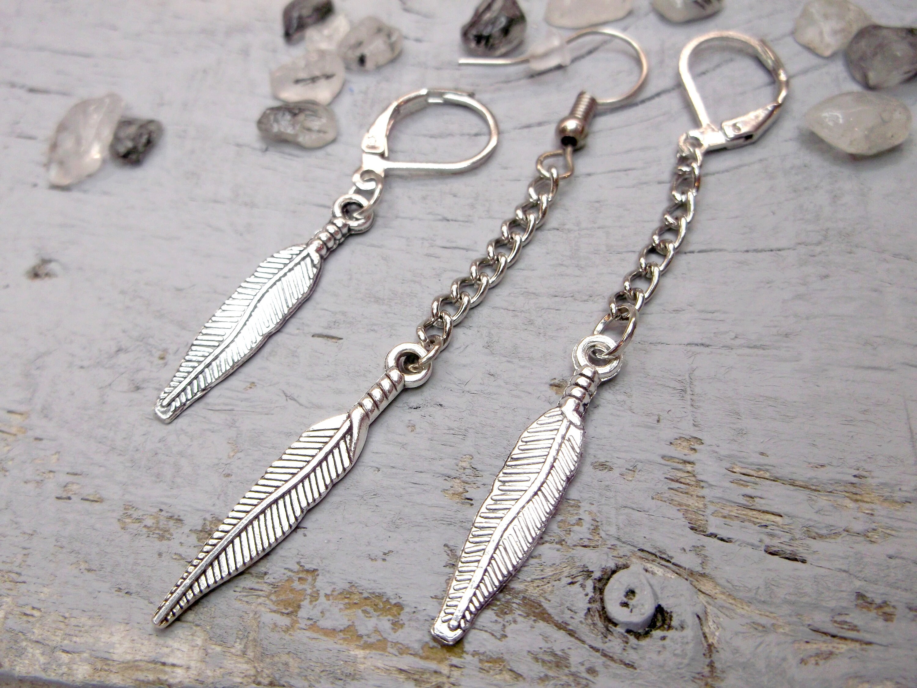 One feather earring Symbolic meaning Feather dangle Men | Etsy