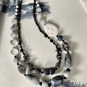 Tow Rows of Marble Colored Stones Statement, Interweaving Gray Stones ...
