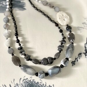Tow Rows of Marble Colored Stones Statement, Interweaving Gray Stones ...