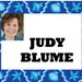 Class Library Genre and Author Bin Labels With Posters in an Ocean ...
