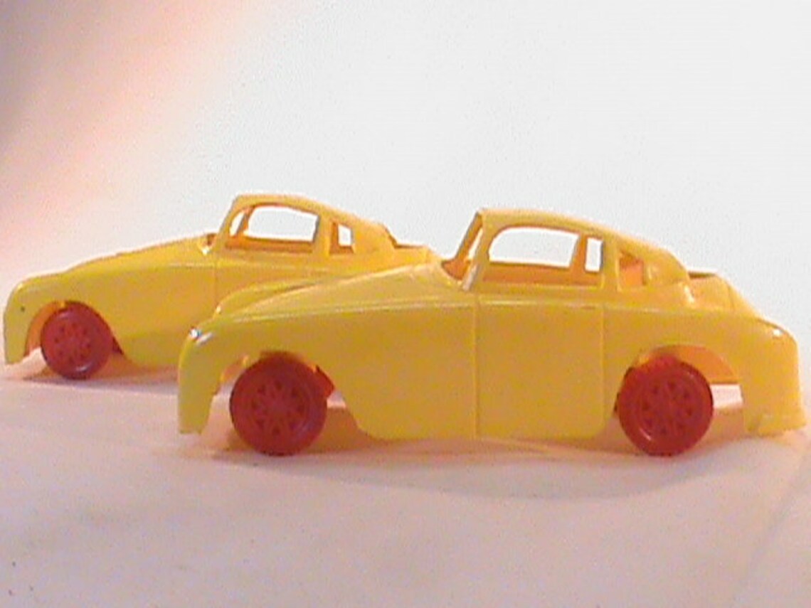 2 Vintage Yellow Plastic Hard Shell Toy Cars With Red Wheels - Etsy