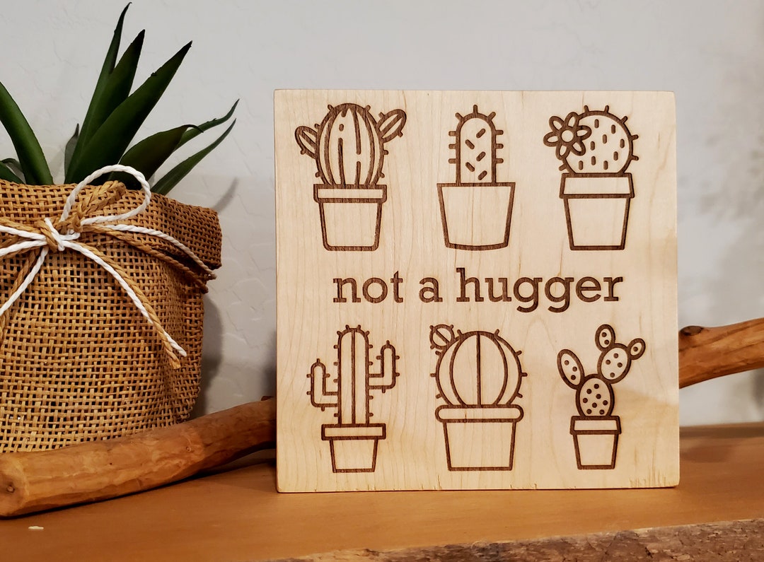 Not a Hugger Wooden Sign - Etsy