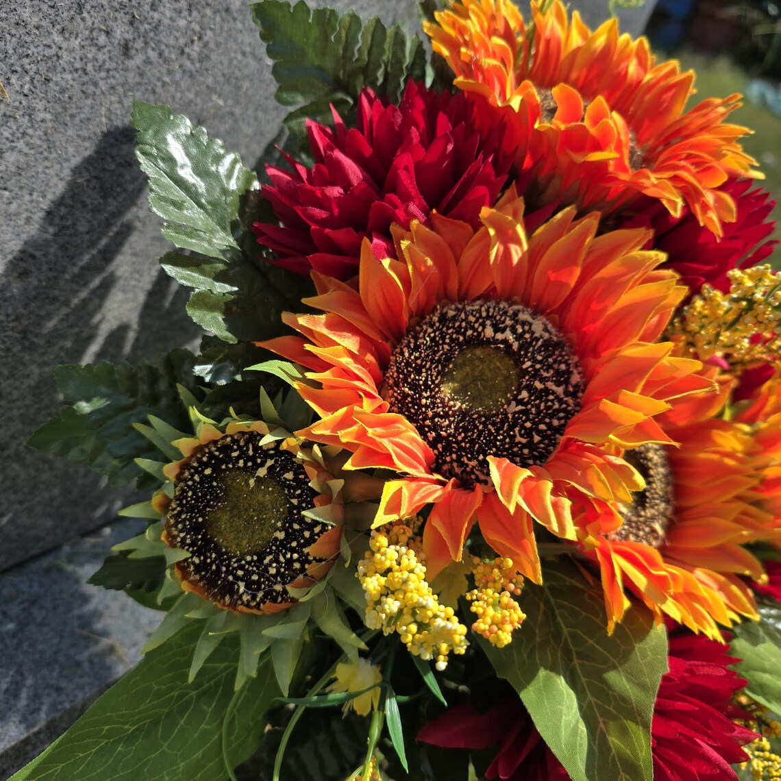 This Cemetery Cone Has Grave Flowers Including Orange Sunflowers ...