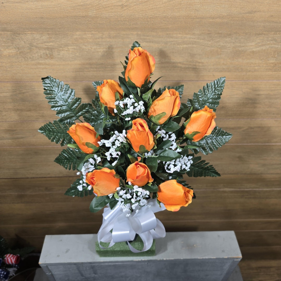 This Cemetery Cone Has Grave Flowers Including Orange Elegant Ruffled ...