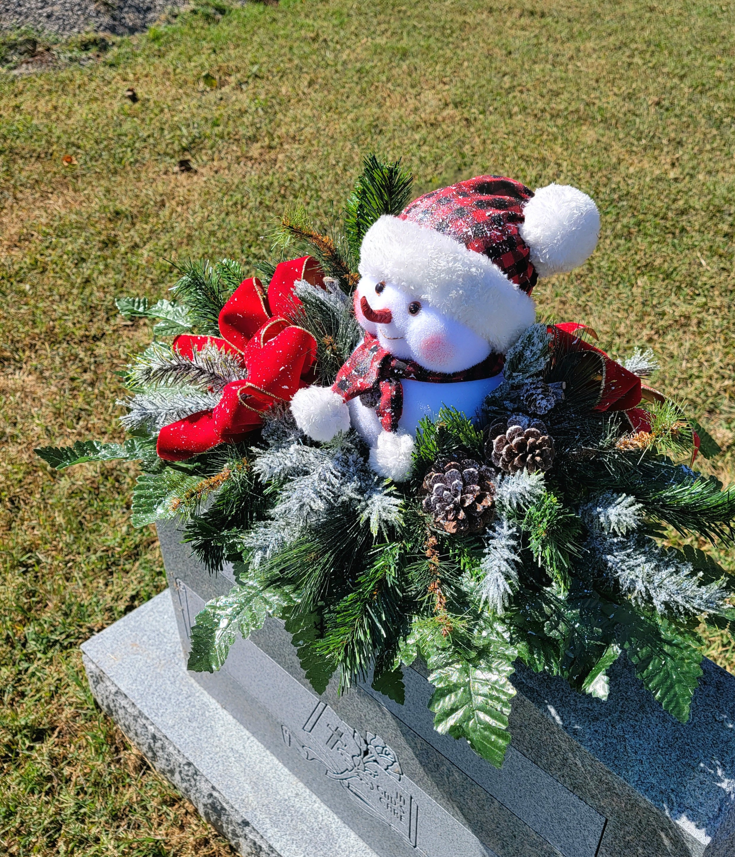 This Chubby Snowman Christmas Cemetery Saddle Has Greenery and a Red ...