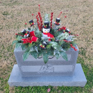 This Headstone Saddle Has a Cute Snowman, Top Hats, Red Glitter Accents ...