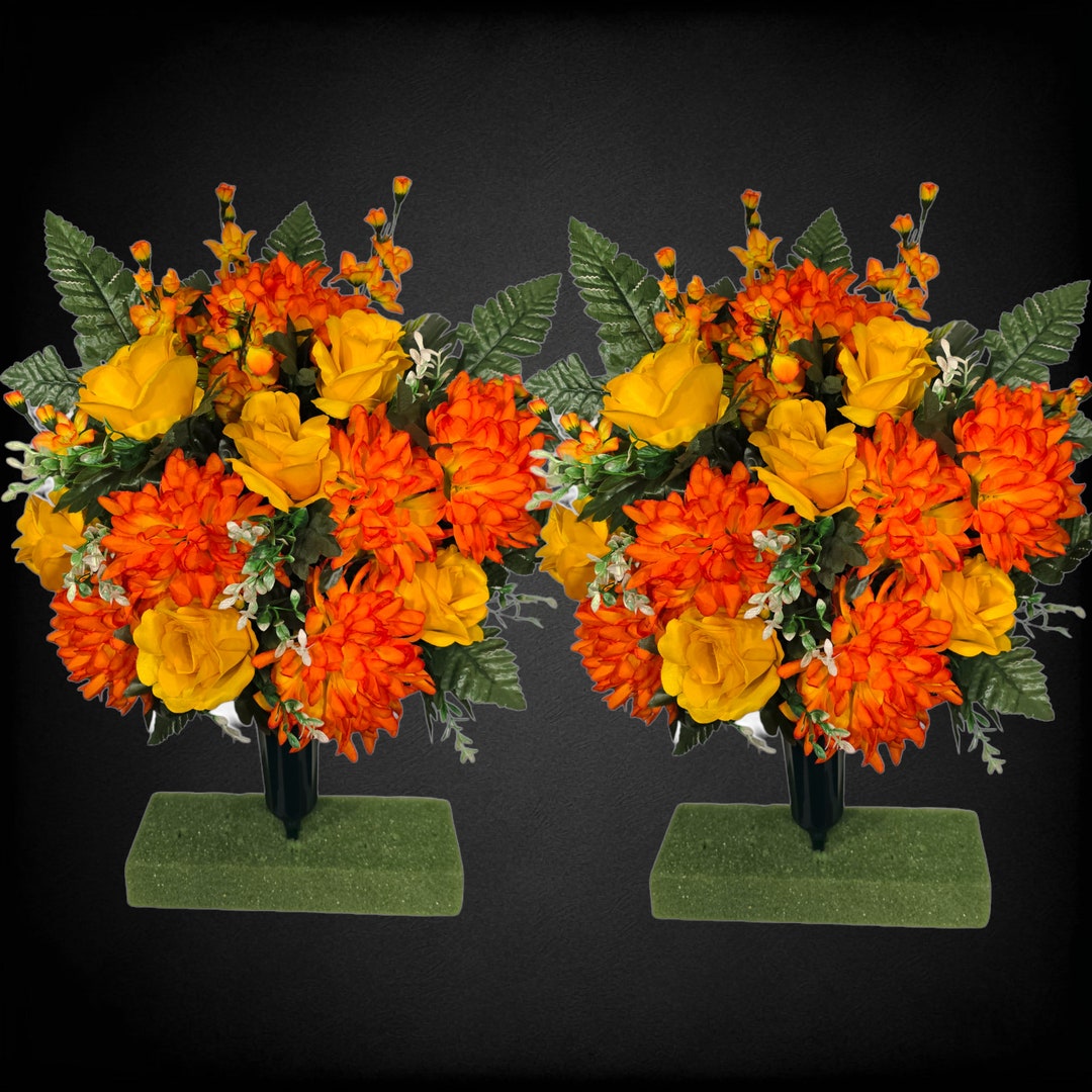 This Cemetery Cone Pair Has Grave Flowers Including Yellow Roses ...