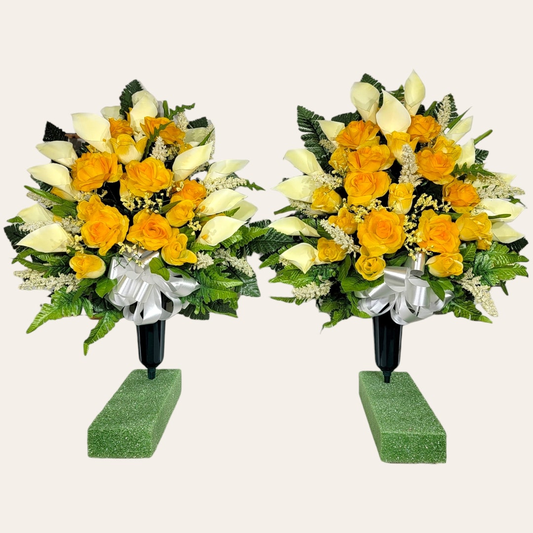 This Jumbo Cemetery Cone Pair Has Nice Flowers Including Yellow Calla ...