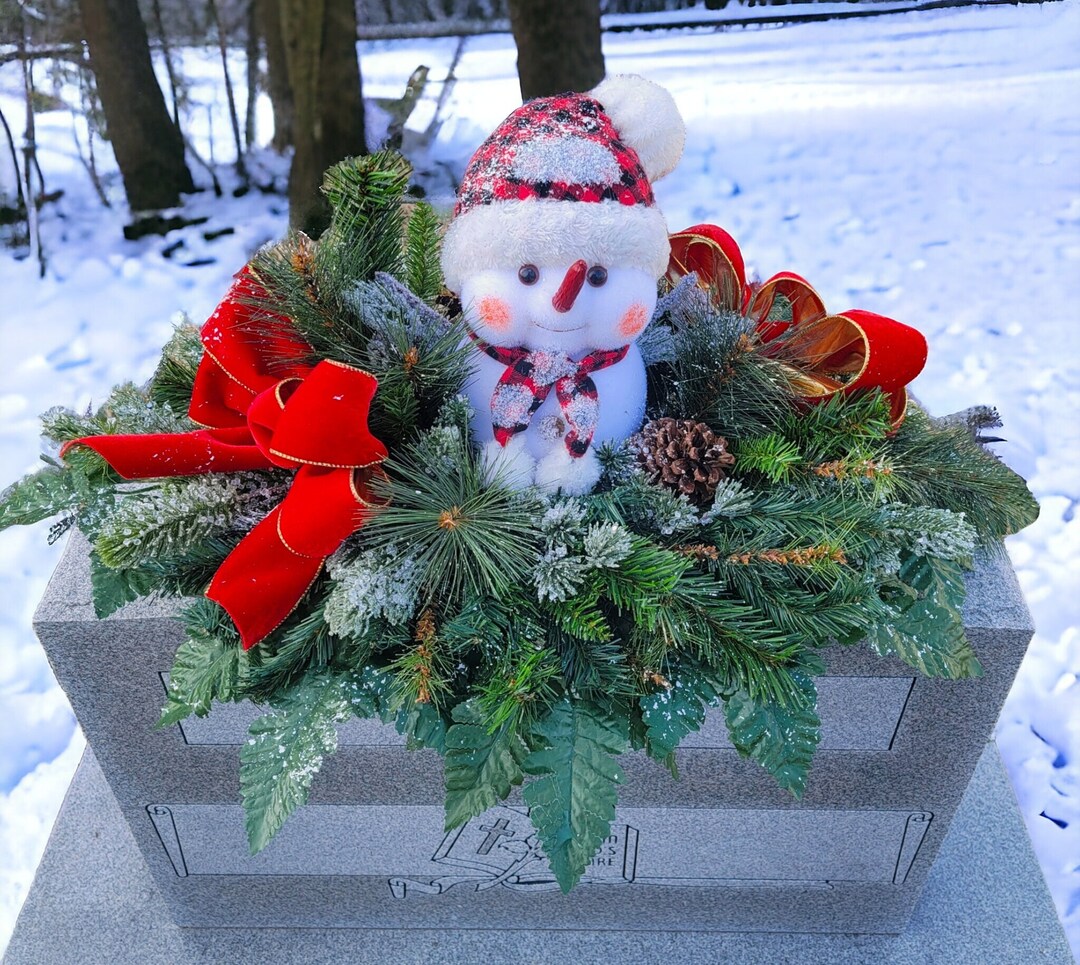 This Chubby Snowman Christmas Cemetery Saddle Has Greenery and a Red ...