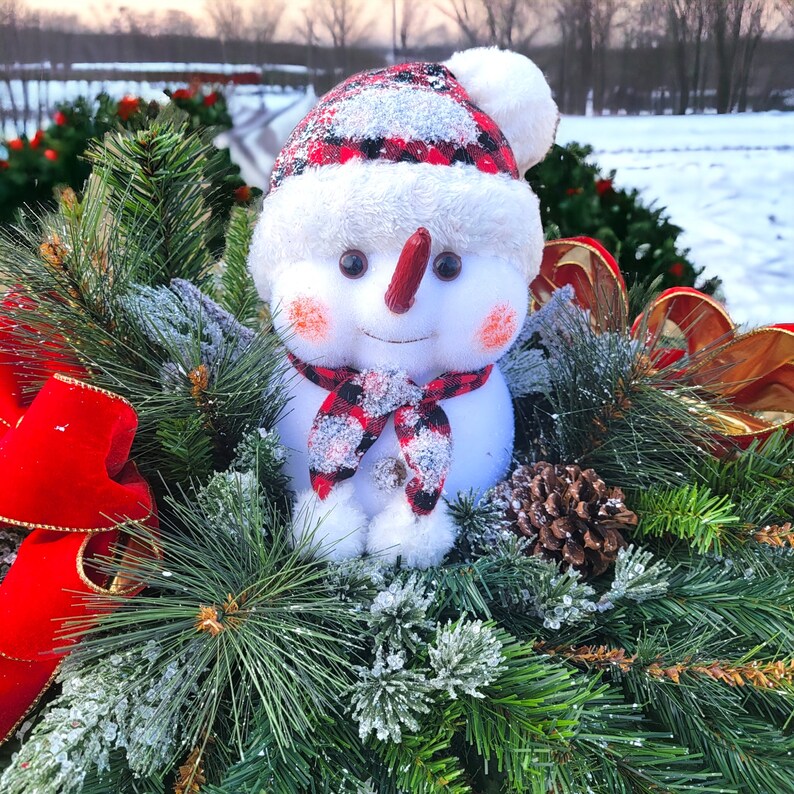 This Chubby Snowman Christmas Cemetery Saddle Has Greenery and a Red ...
