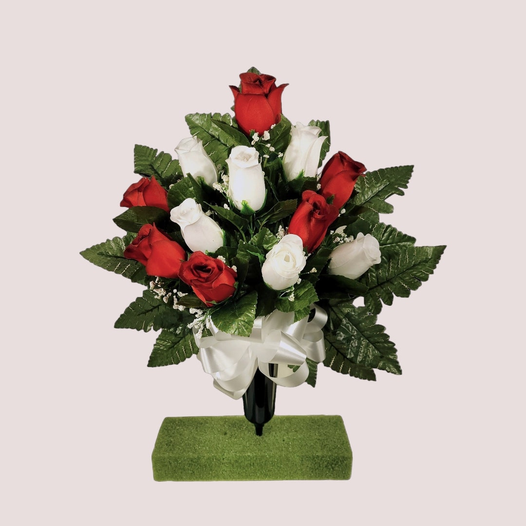 This Memorial Cone Has Grave Flowers Including Red and White Rosebuds ...