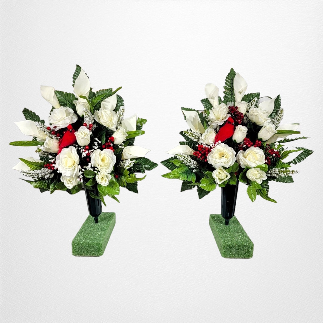 This Cemetery Cone Pair Has Grave Flowers Including Cream Calla Lilies ...