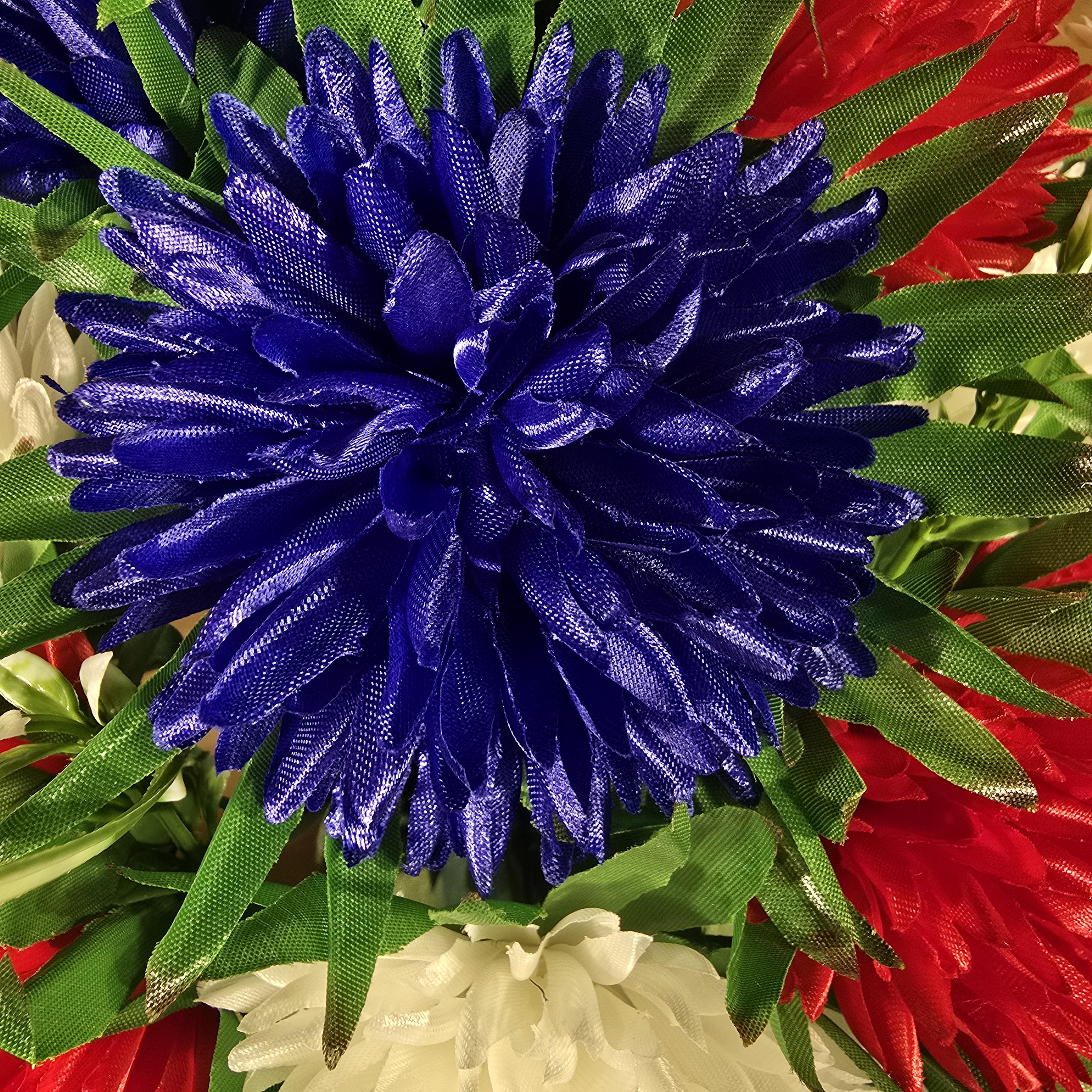 This Cemetery Cone Has Grave Flowers Including Red, White, and Blue ...