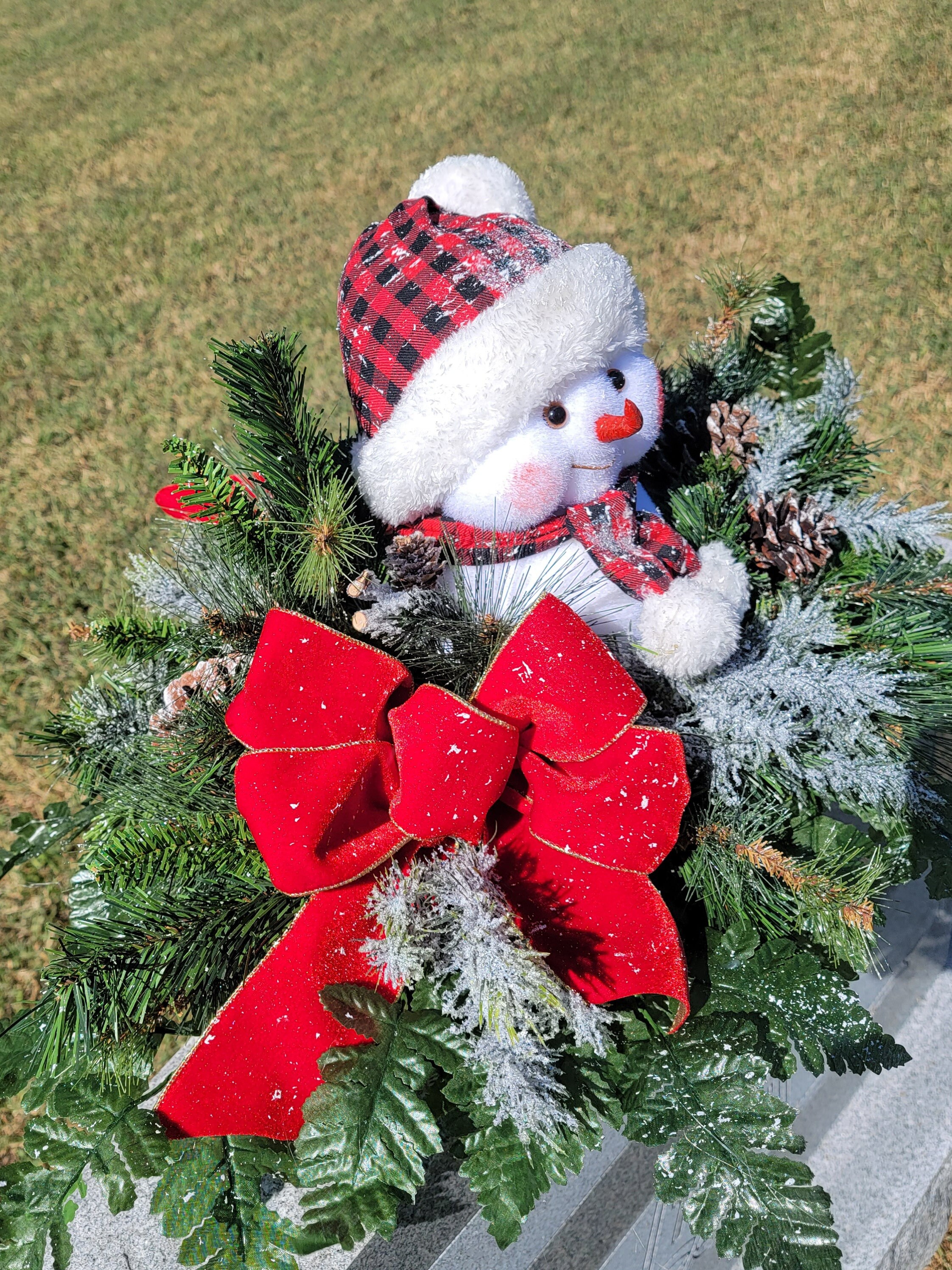 This Chubby Snowman Christmas Cemetery Saddle Has Greenery and a Red ...