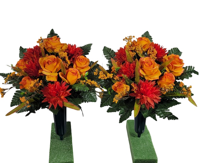 This Cemetery Cone Pair Has Grave Flowers Including Mums and 2 Tone ...