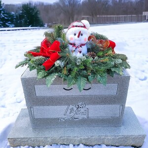 This Chubby Snowman Christmas Cemetery Saddle Has Greenery and a Red ...