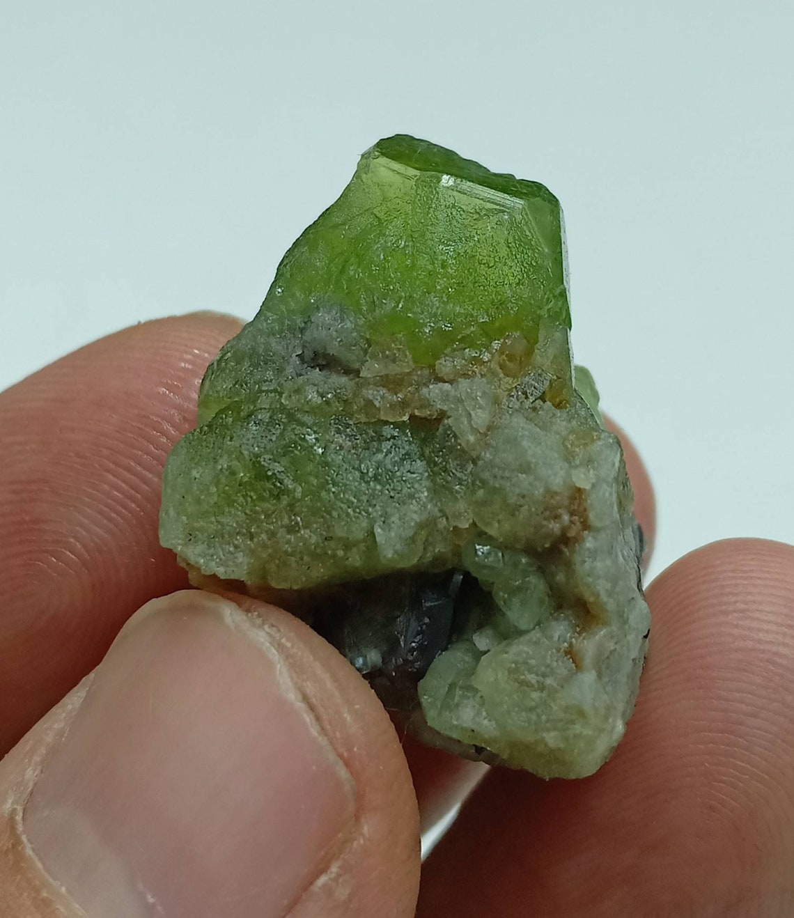 A perfectly terminated peridot crystals specimen with | Etsy