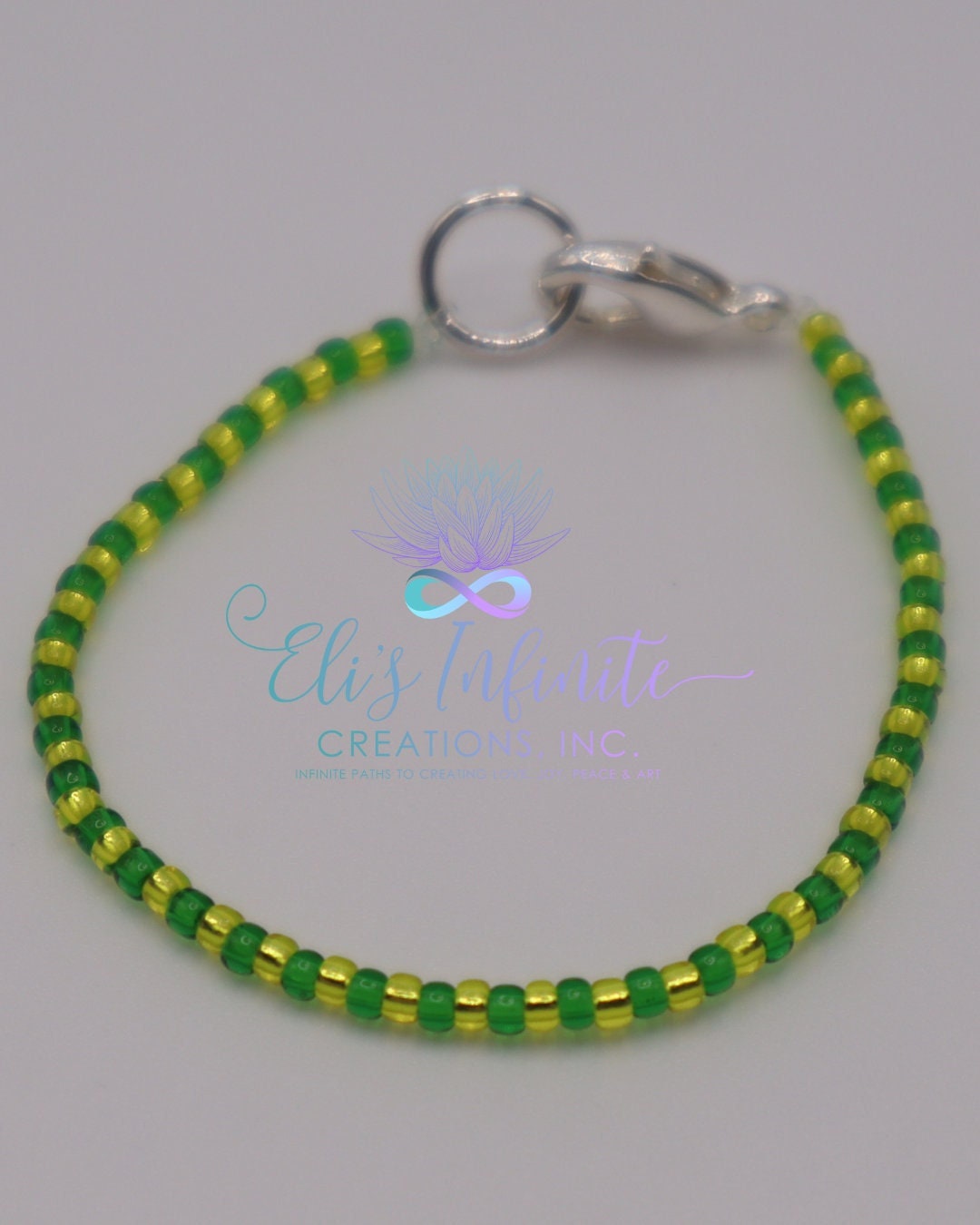 Ilde of Orula - Small (2mm) Transparent Green and Shiny Yellow Seed ...