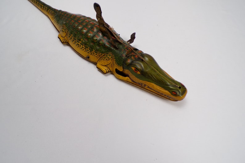 J. Chein & Co Tin Litho Indigenous Boy Riding an Alligator Wind Up - Etsy