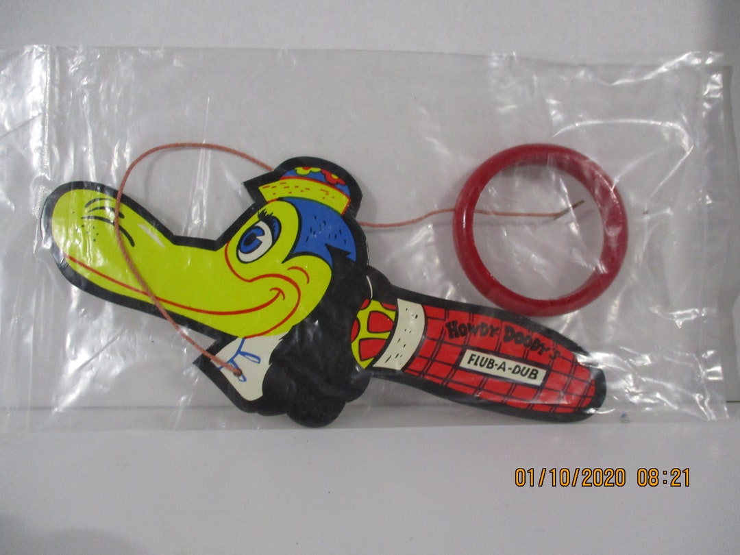 Flub a Dub Hand Held Skill Toy - Etsy