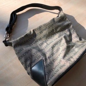 Old armani pouch store